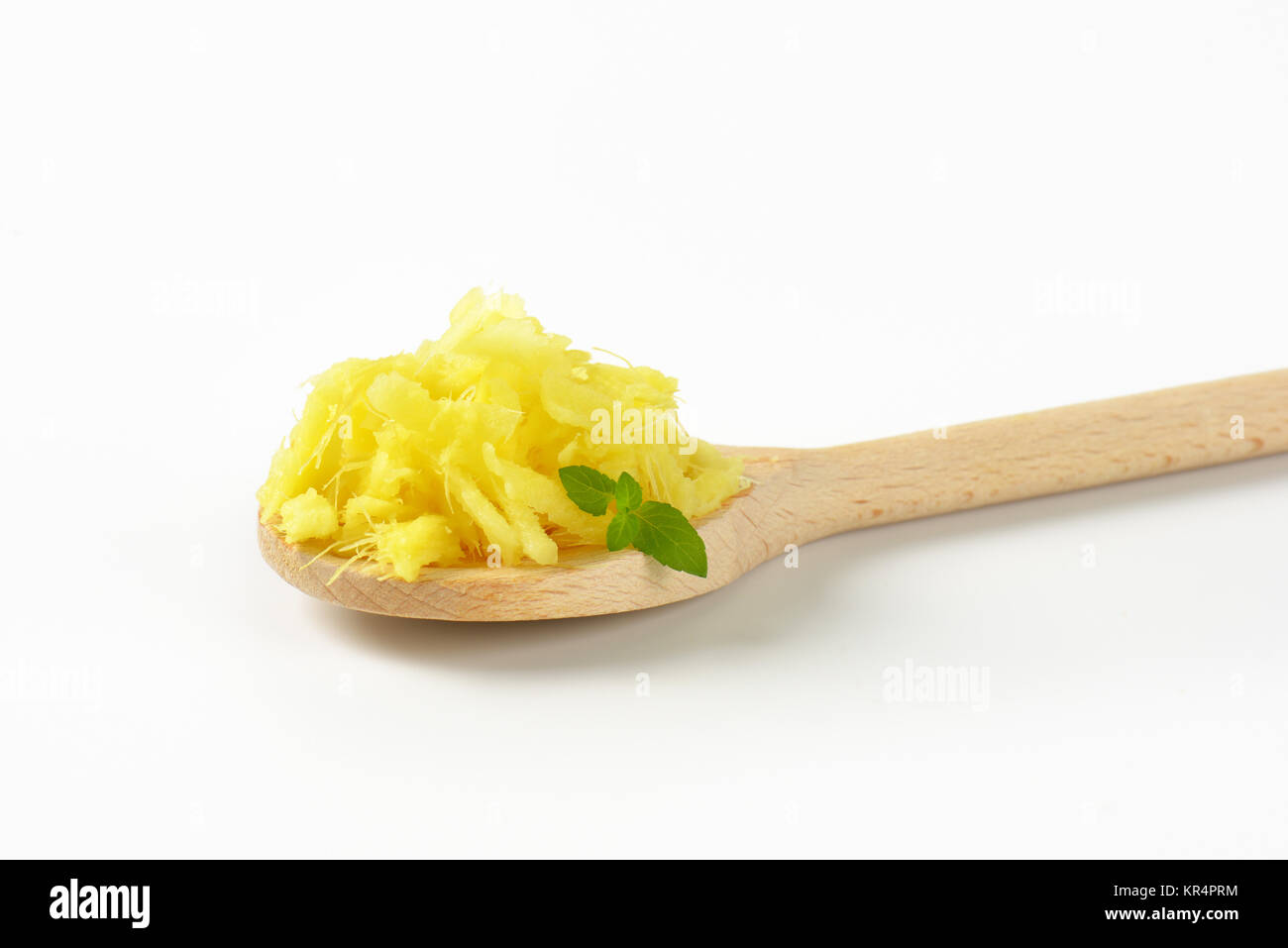 grated ginger on spoon Stock Photo - Alamy