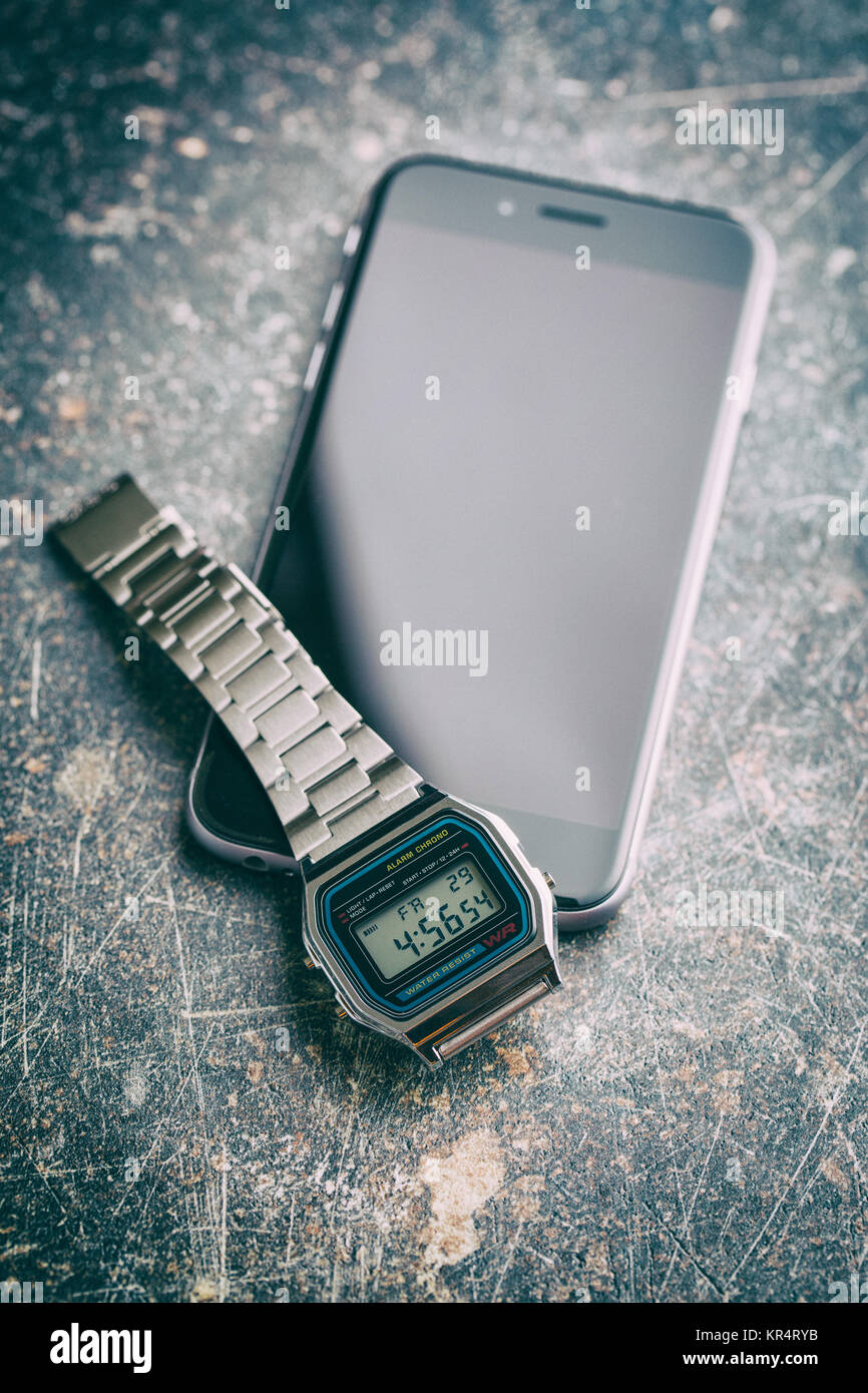 digital watch and cellphone Stock Photo - Alamy