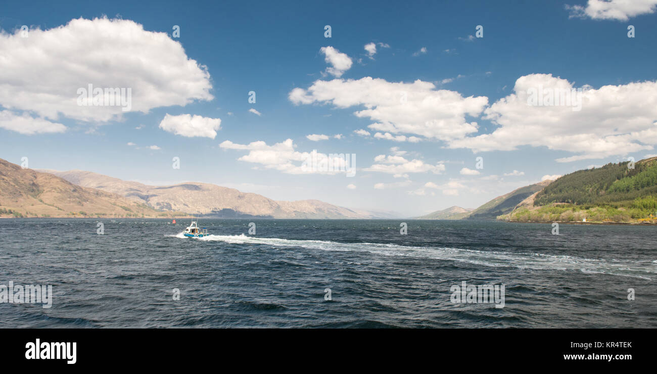 A boat in Loch Linnhe sea loch, part of the Great Glen fault through ...