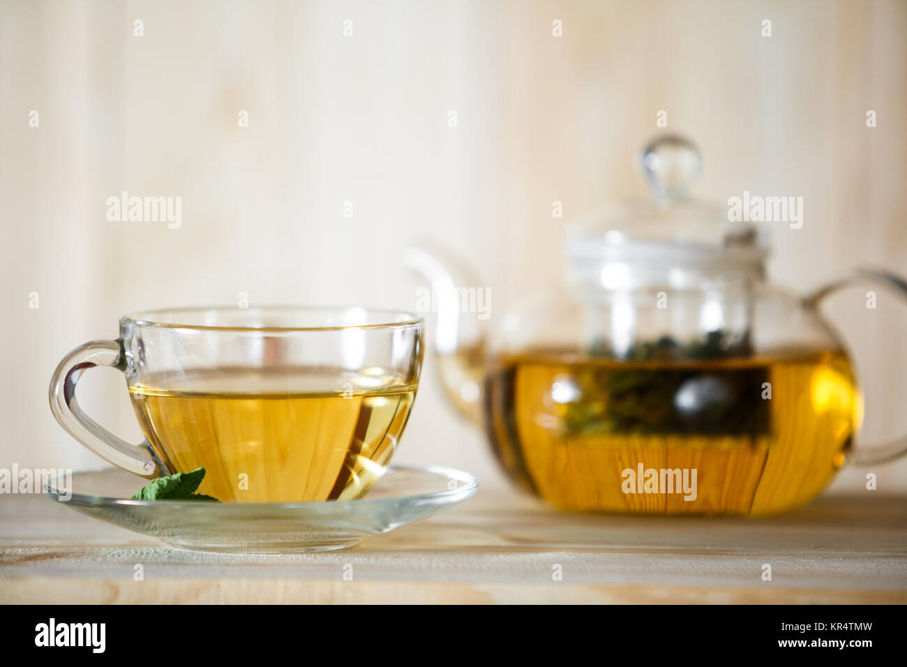 Hot herbal healthy tea with ingredients and vitamin in the cafe table ...