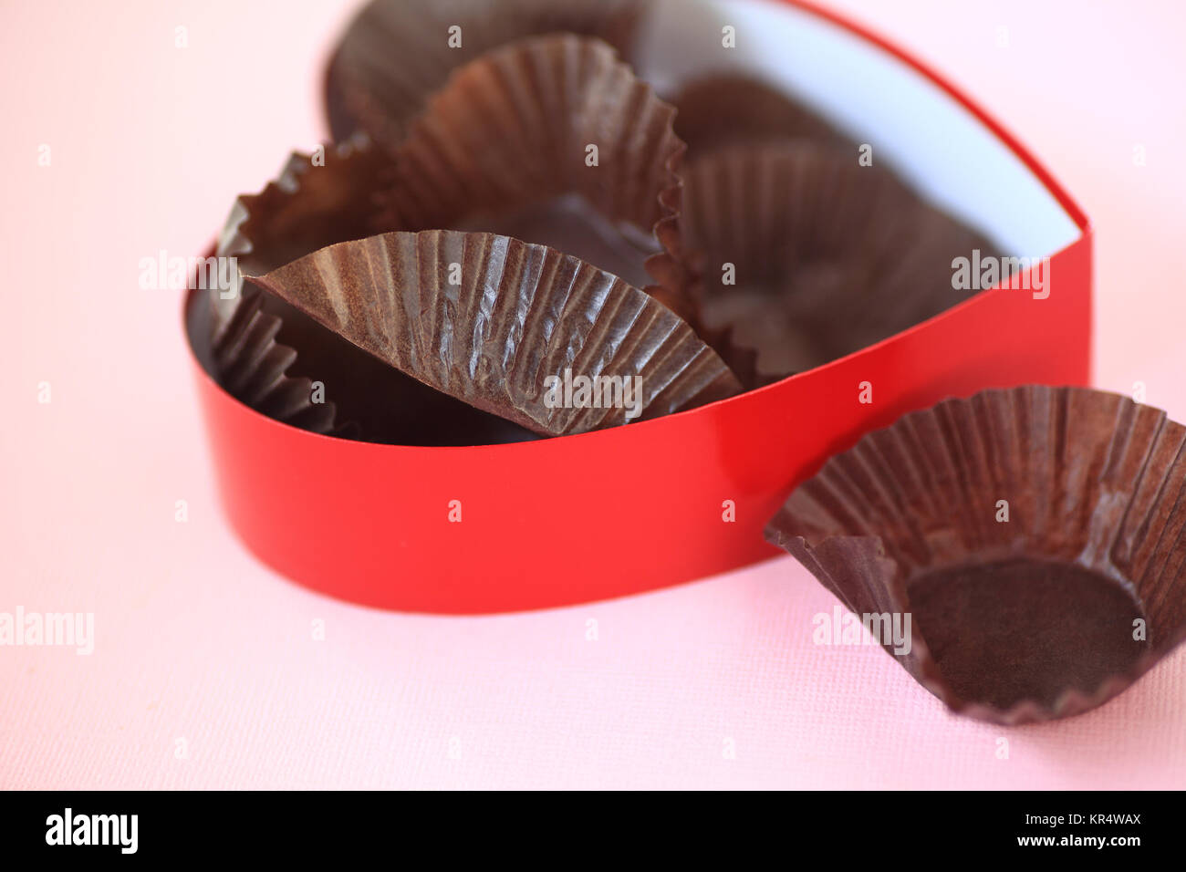 Empty paper wrappers in Valentine box Stock Photo - Alamy