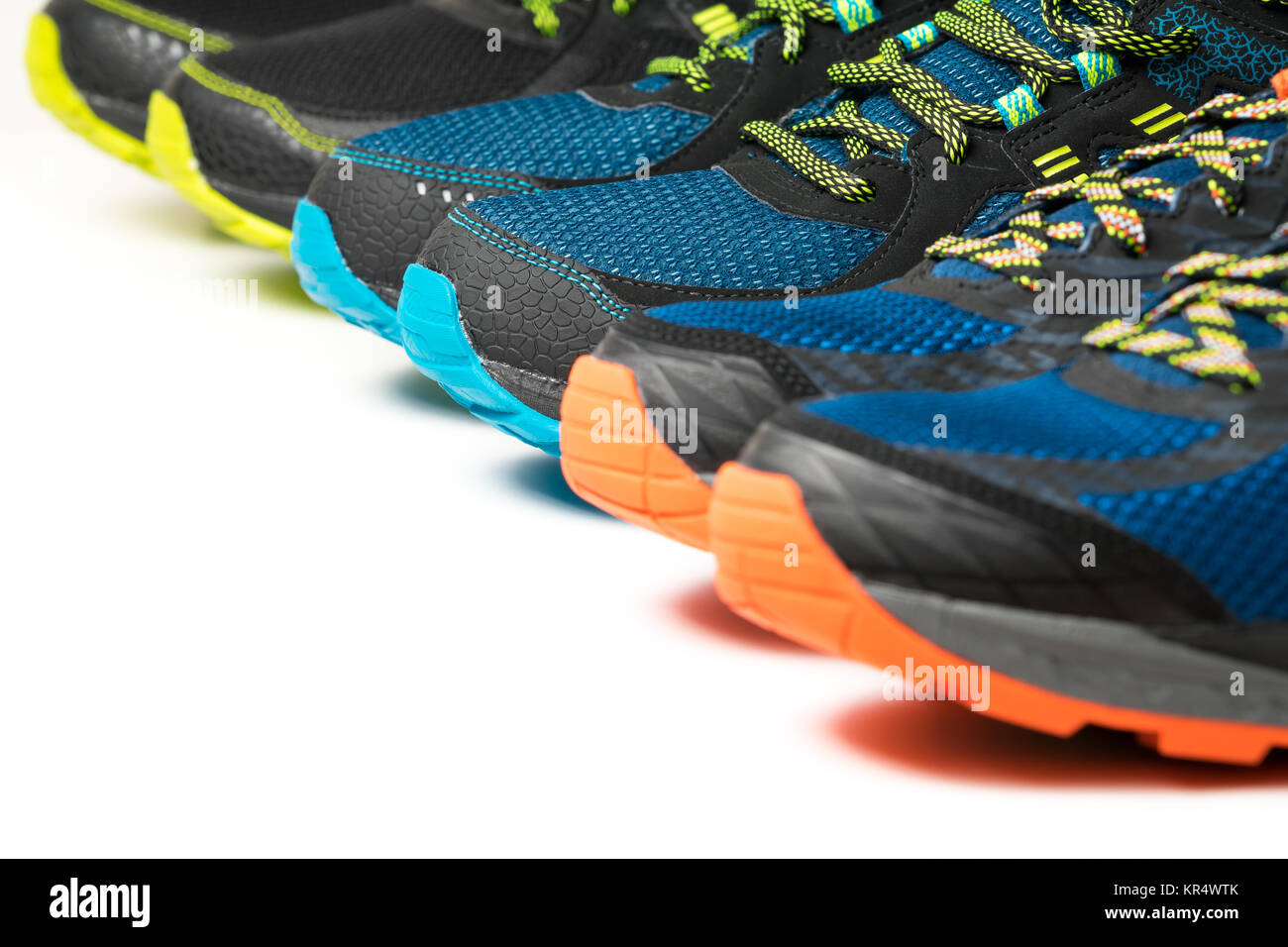 Row of pairs of shoes on white hi-res stock photography and images - Alamy