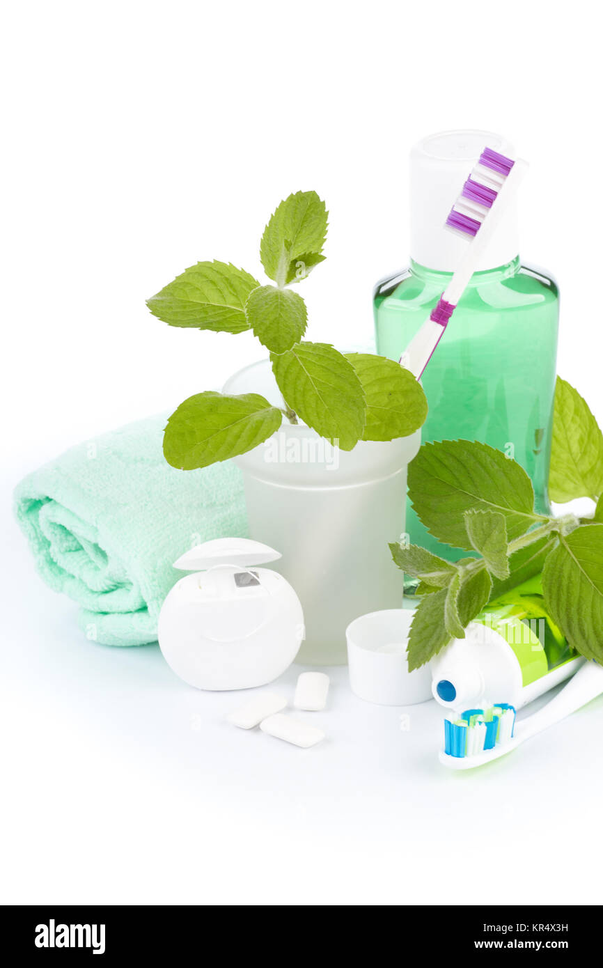 Toothbrush with toothpaste and fresh leaves of mint Stock Photo - Alamy