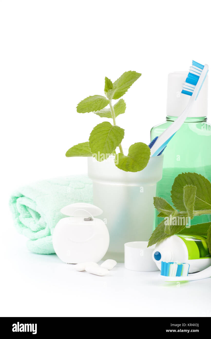 Toothbrush with toothpaste and fresh leaves of mint Stock Photo - Alamy
