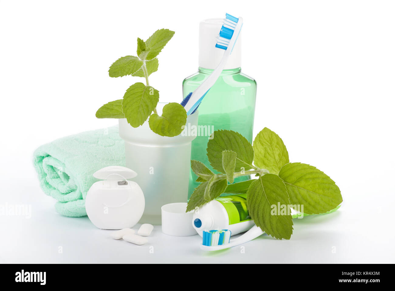 Toothbrush with toothpaste and fresh leaves of mint Stock Photo - Alamy
