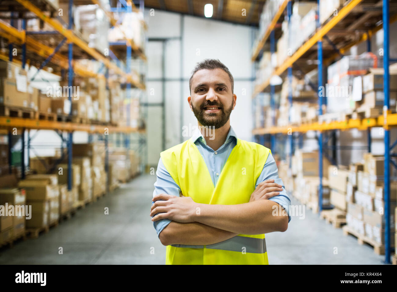 Portrait of a male warehouse worker Stock Photo - Alamy