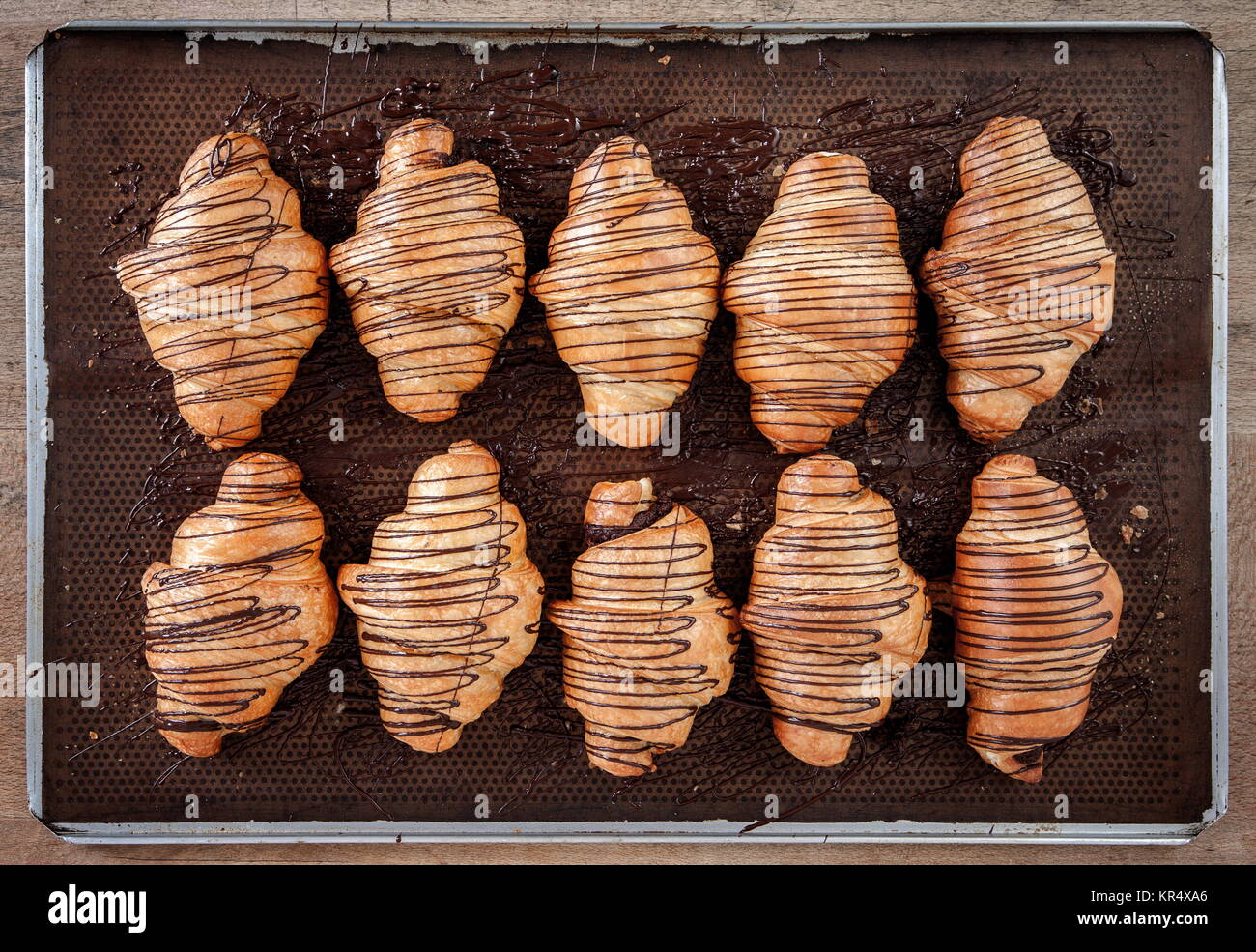 Baked croissant on two lines Stock Photo - Alamy