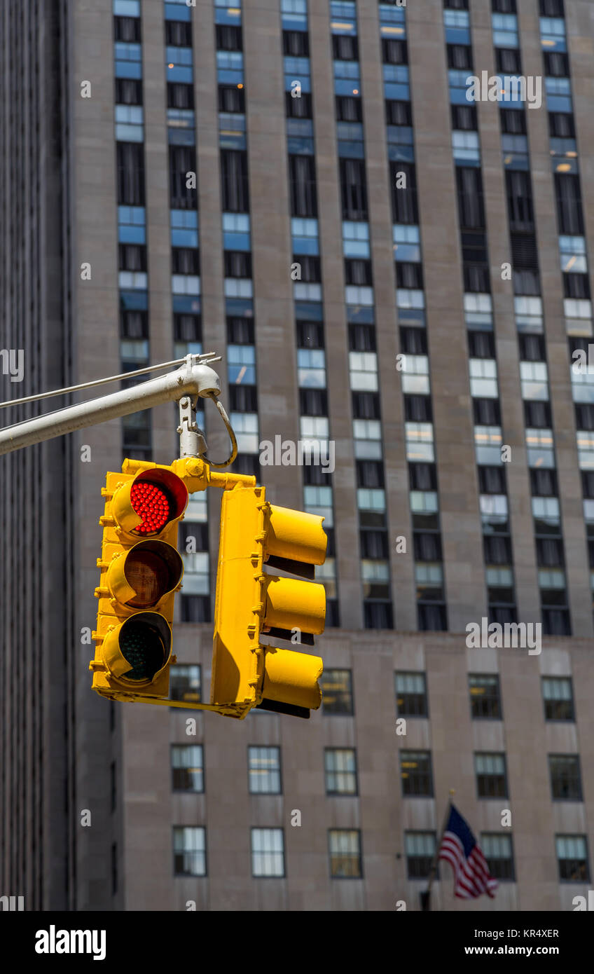 yellow traffic light on the background of skyscrapers in NY Stock Photo ...