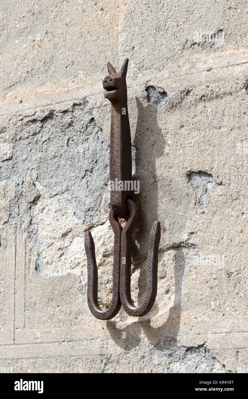 Side view of a medieval torch holder in the town San Gimignano in ...