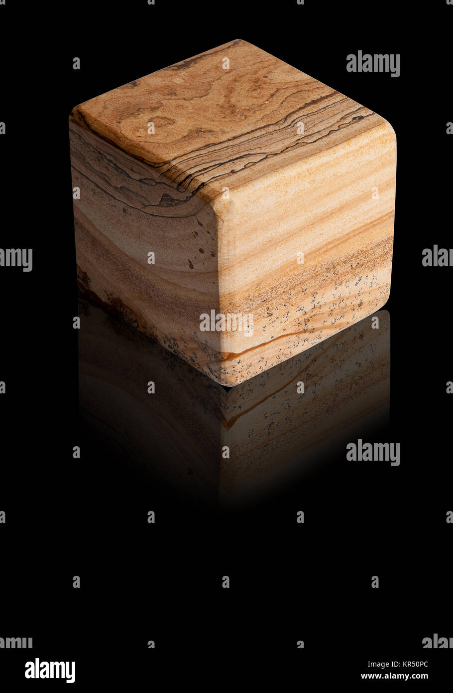 Beige landscape jasper cube with ground reflection on the black ...