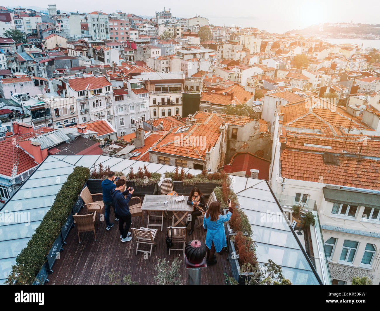 Friends on the Rooftop Stock Photo - Alamy