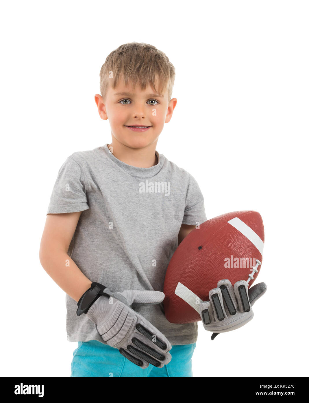 Portrait Of Boy Holding American Football Stock Photo - Alamy