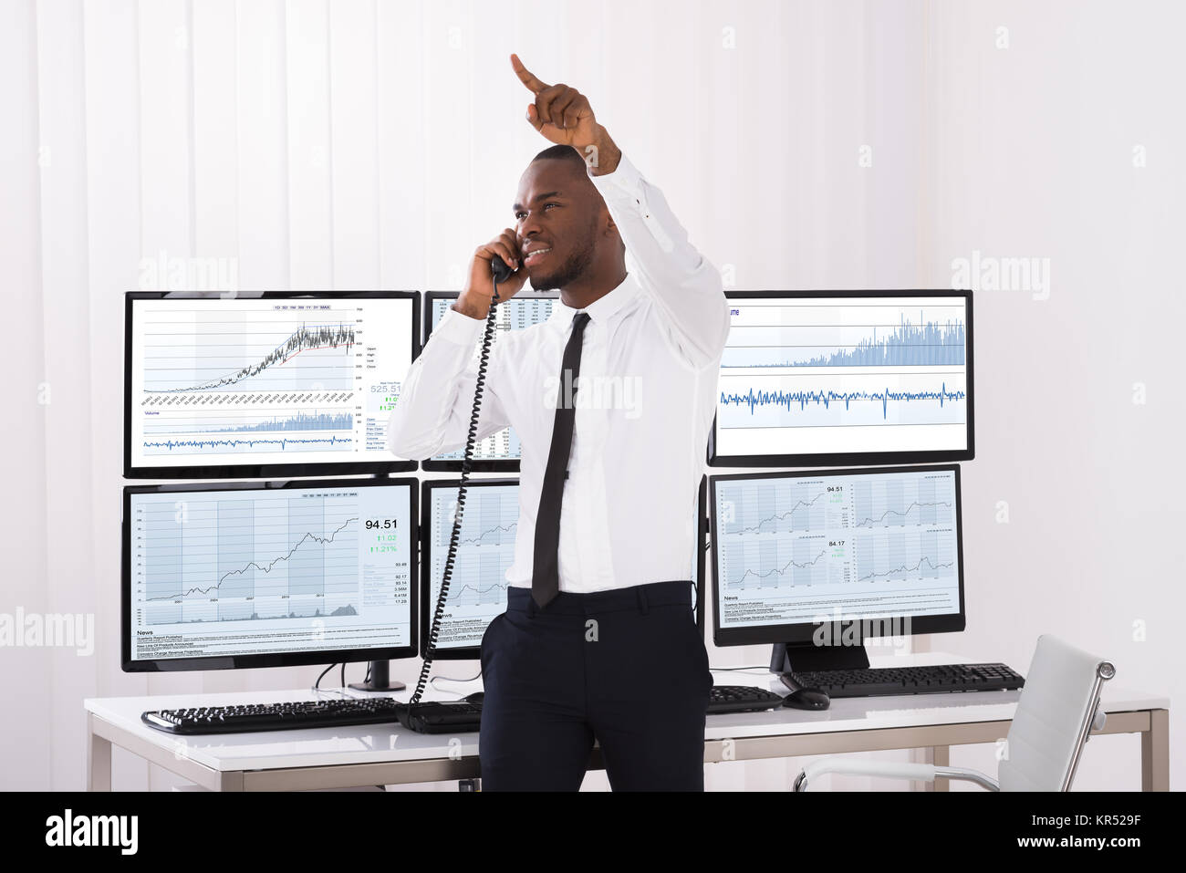 Male Stock Trader Talking On Telephone Stock Photo - Alamy