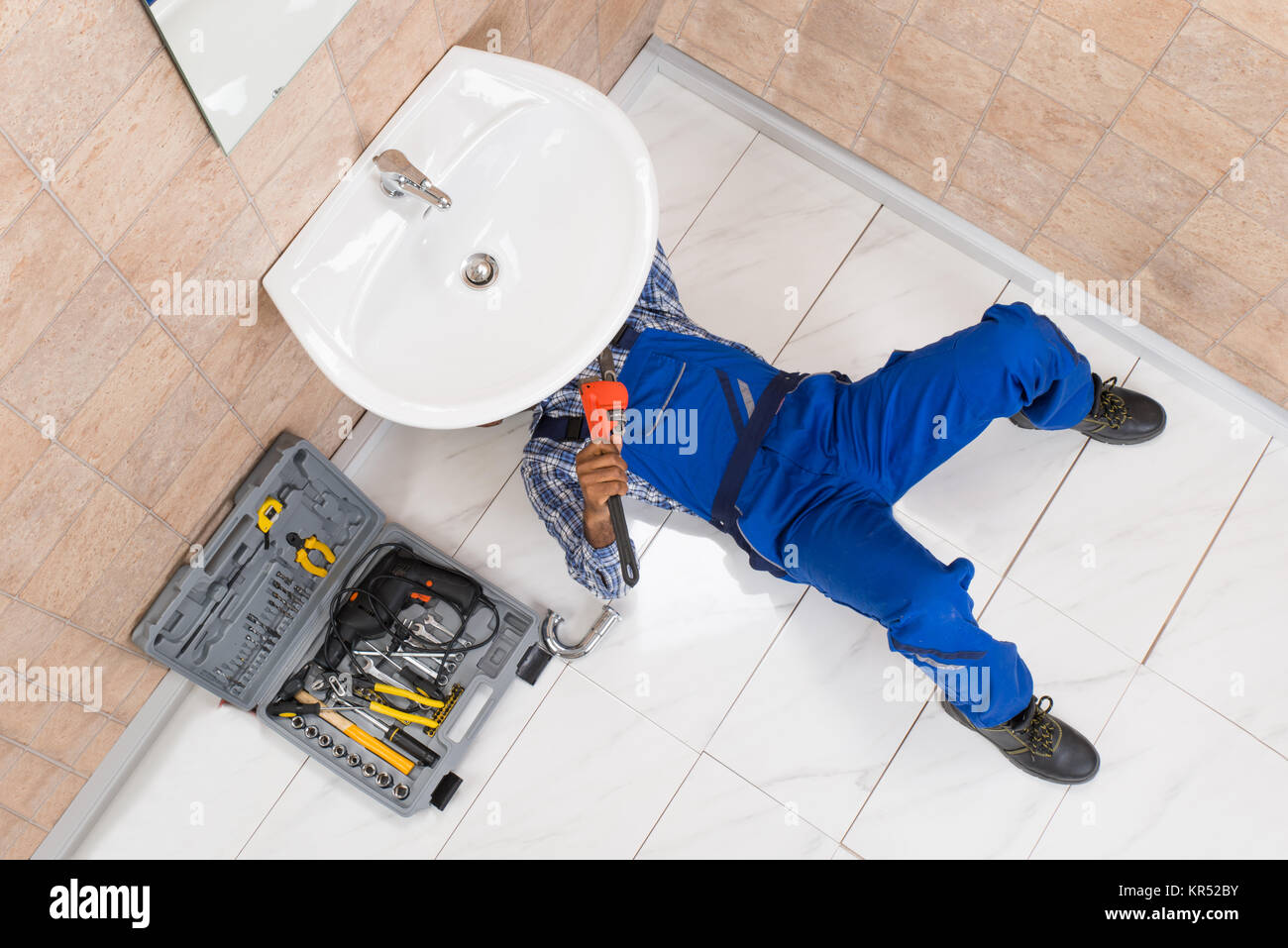 Fixing tiles in bathroom hi-res stock photography and images - Alamy