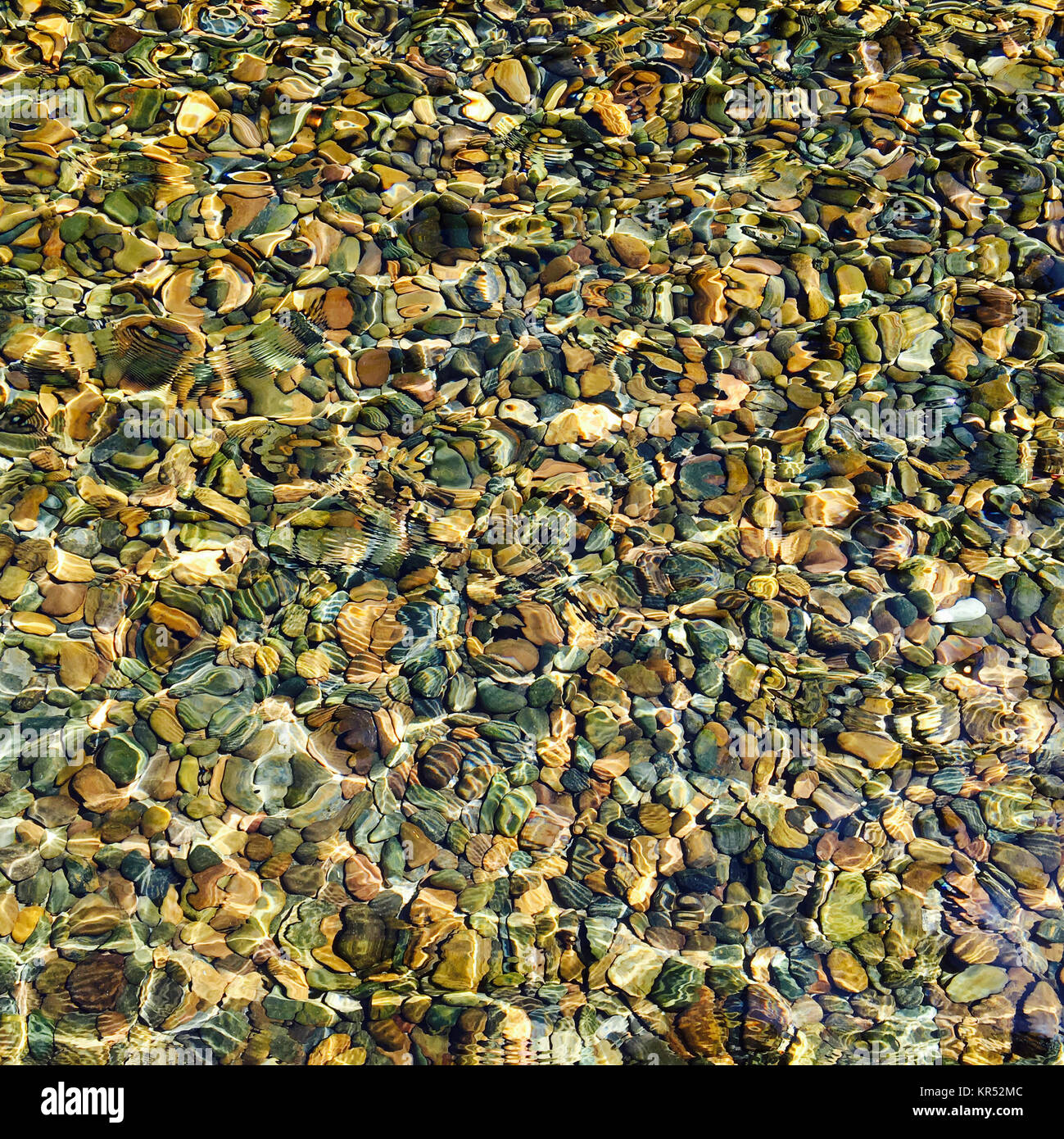 top view water reflection with stone pebbles Stock Photo - Alamy
