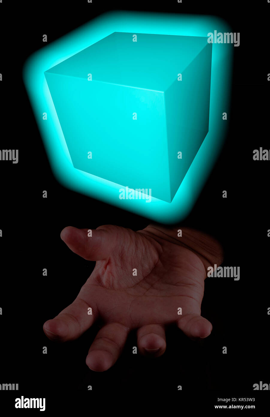 Magic cube over hand Stock Photo - Alamy