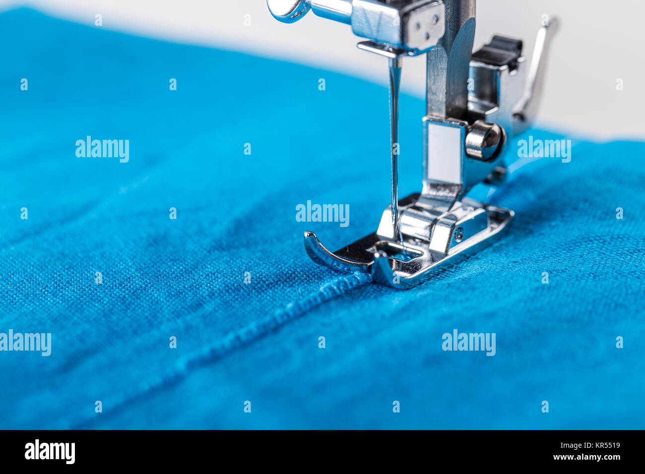 Sewing machine and fabric Stock Photo - Alamy