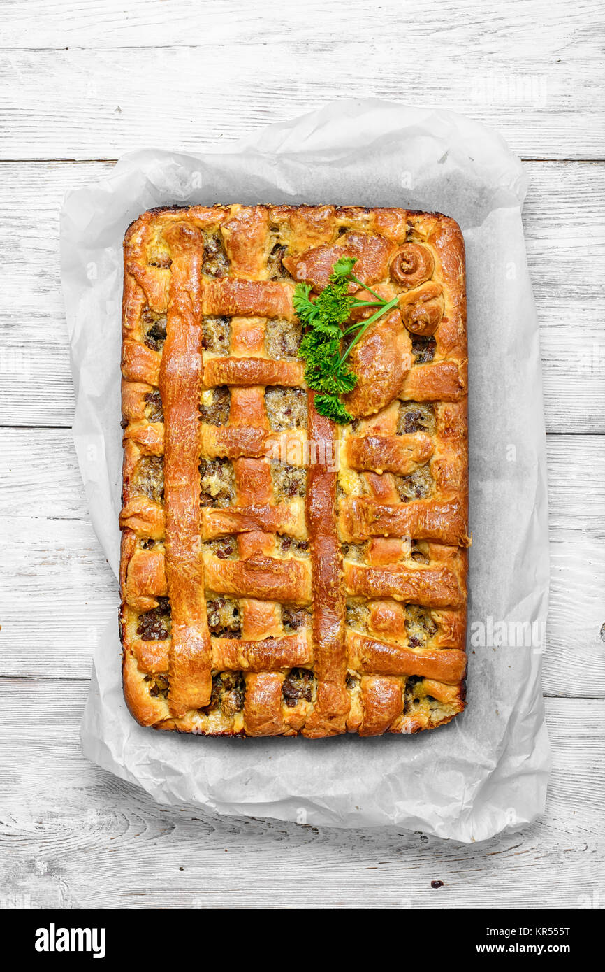 Fragrant meat pie on parchment.View from the top Stock Photo - Alamy