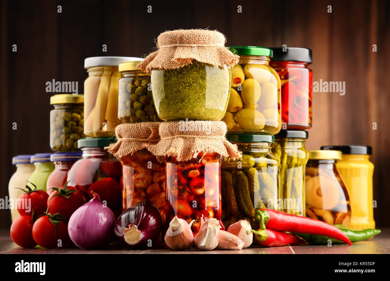 Jars with variety of pickled vegetables Stock Photo - Alamy