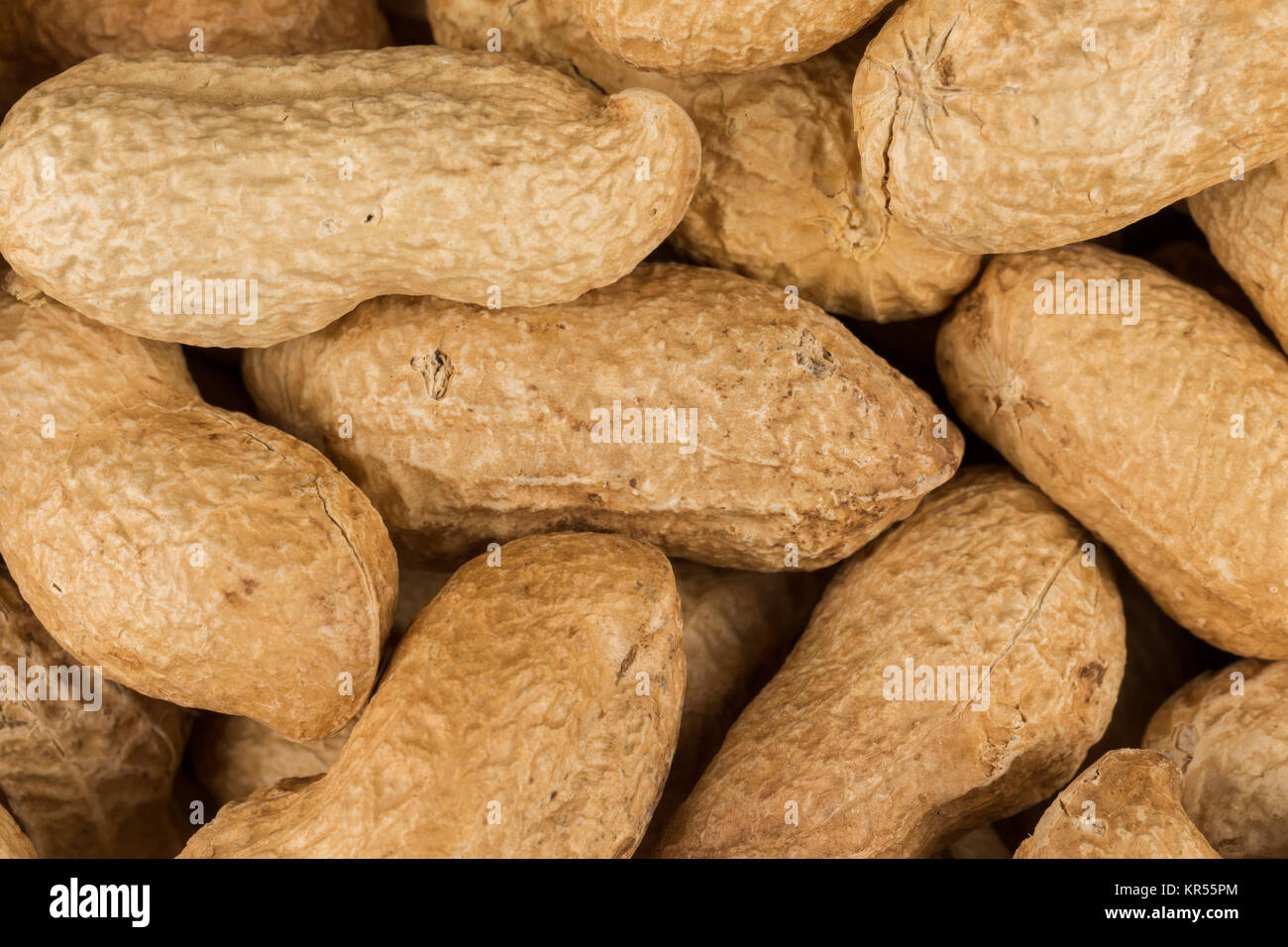 Pile of peanuts shells close up Stock Photo - Alamy