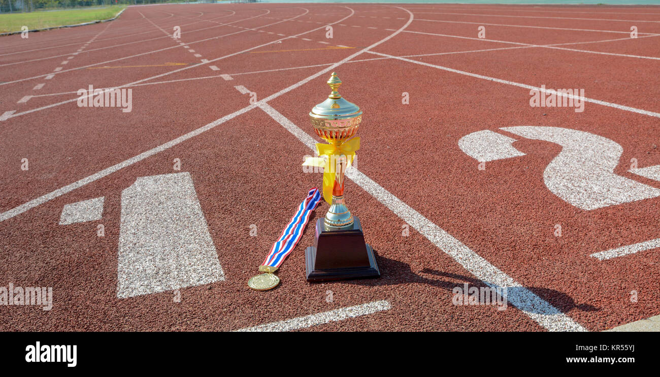 gold cup winner, track running Stock Photo - Alamy