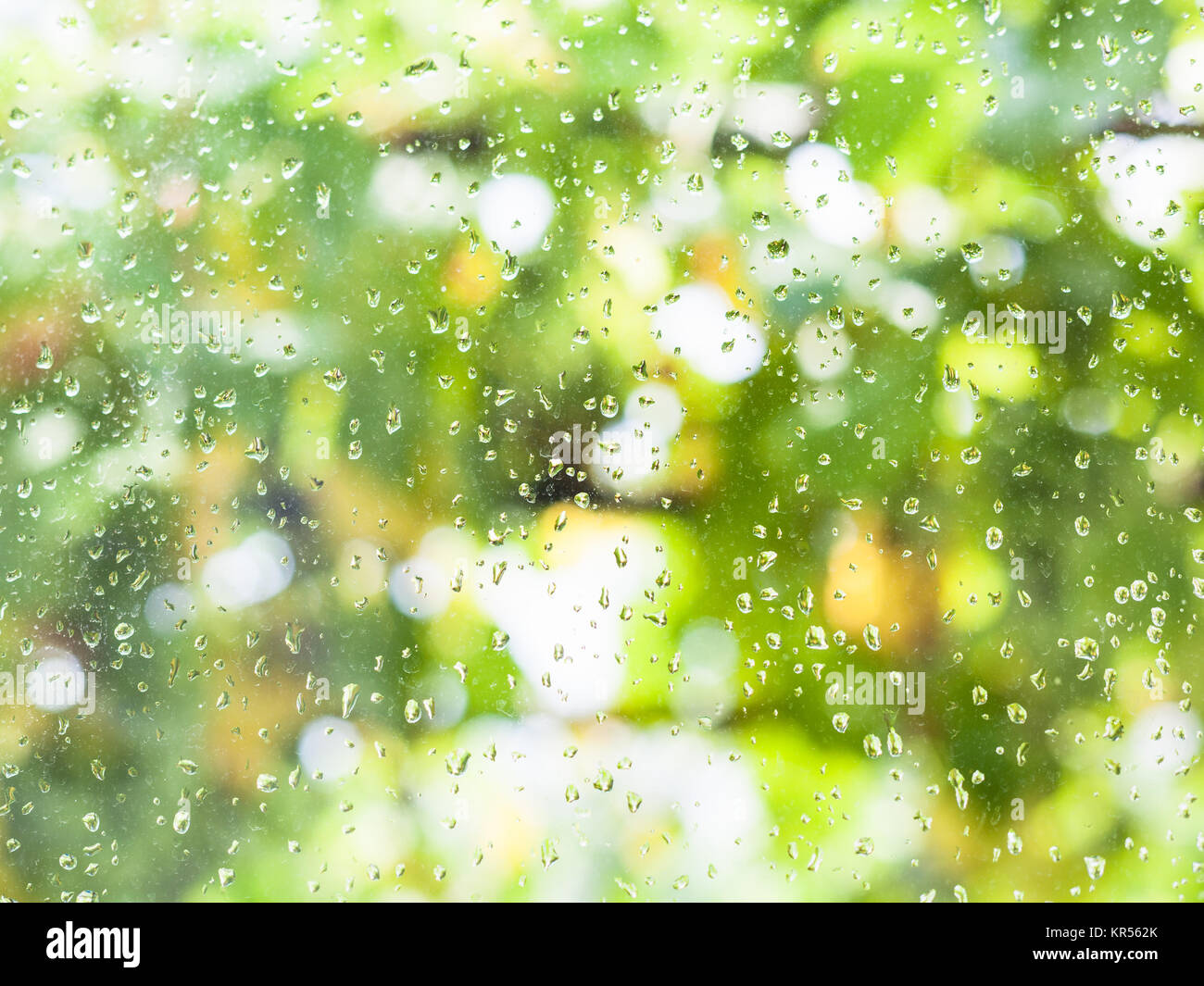 rain drops on windowpane of country house Stock Photo - Alamy
