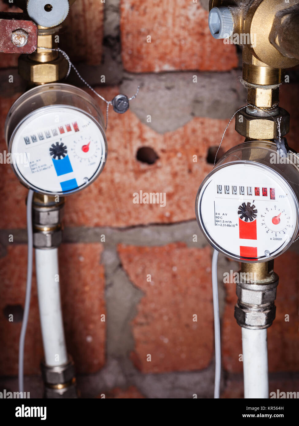 pair new mechanical water meters Stock Photo - Alamy