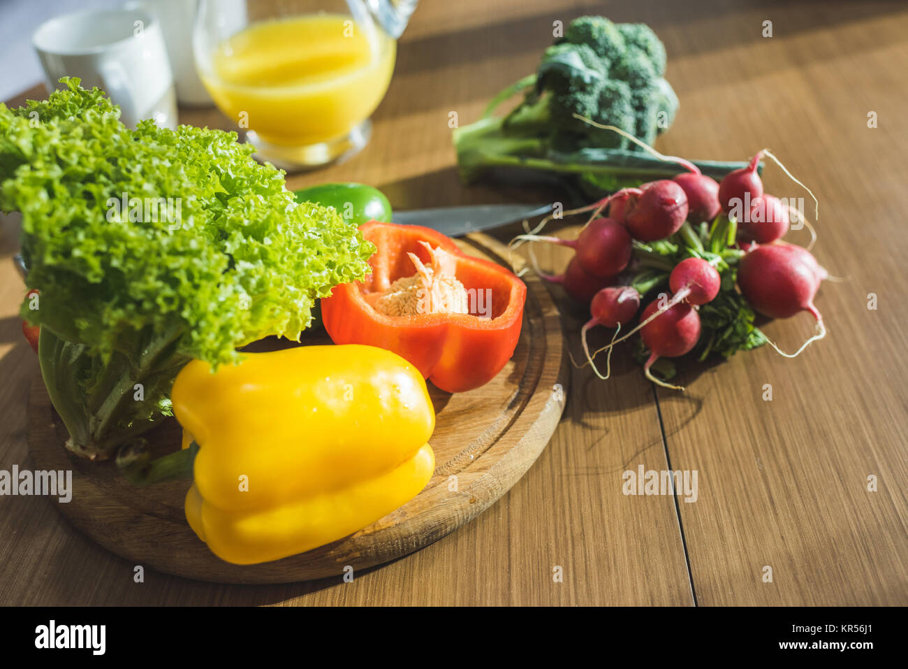 Fresh vegetables and cutting board Stock Photo - Alamy