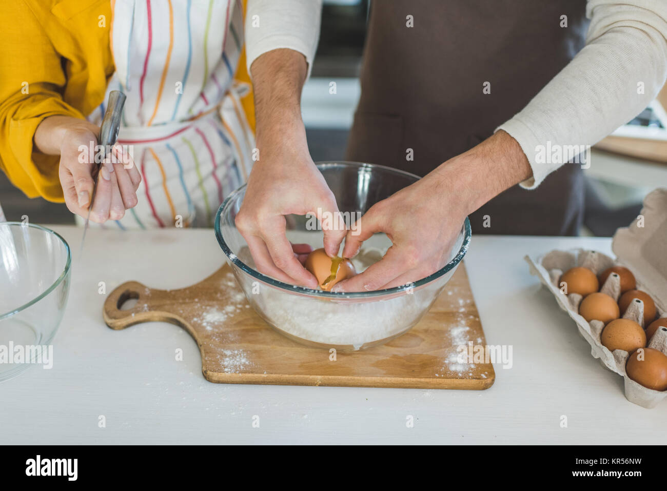 Young couple preparing homemade meal hi-res stock photography and images - Alamy