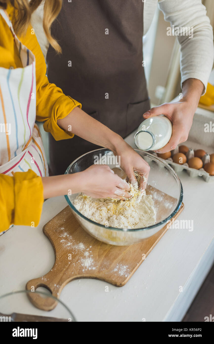 couple making dough Stock Photo - Alamy