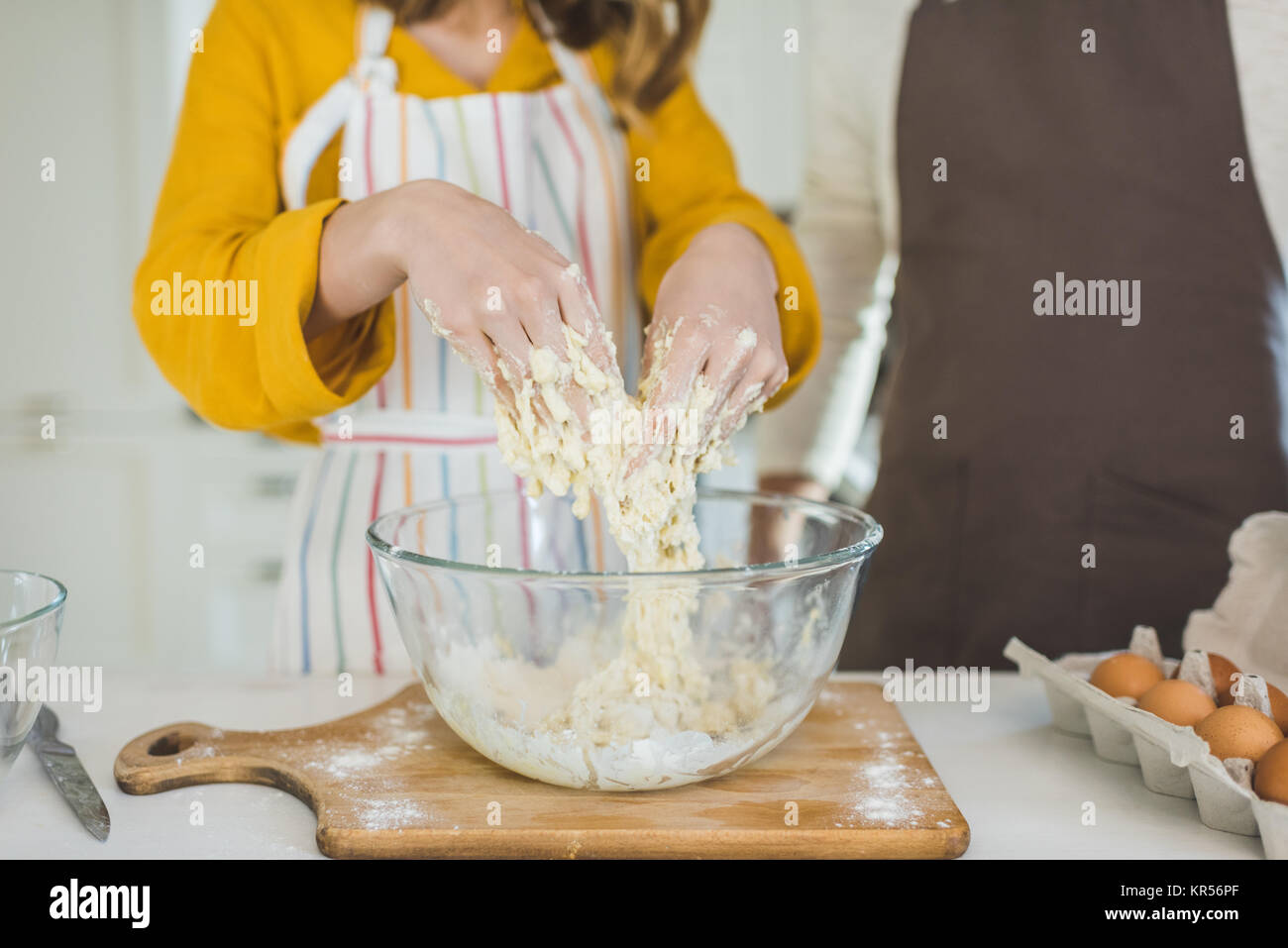 couple making dough Stock Photo - Alamy