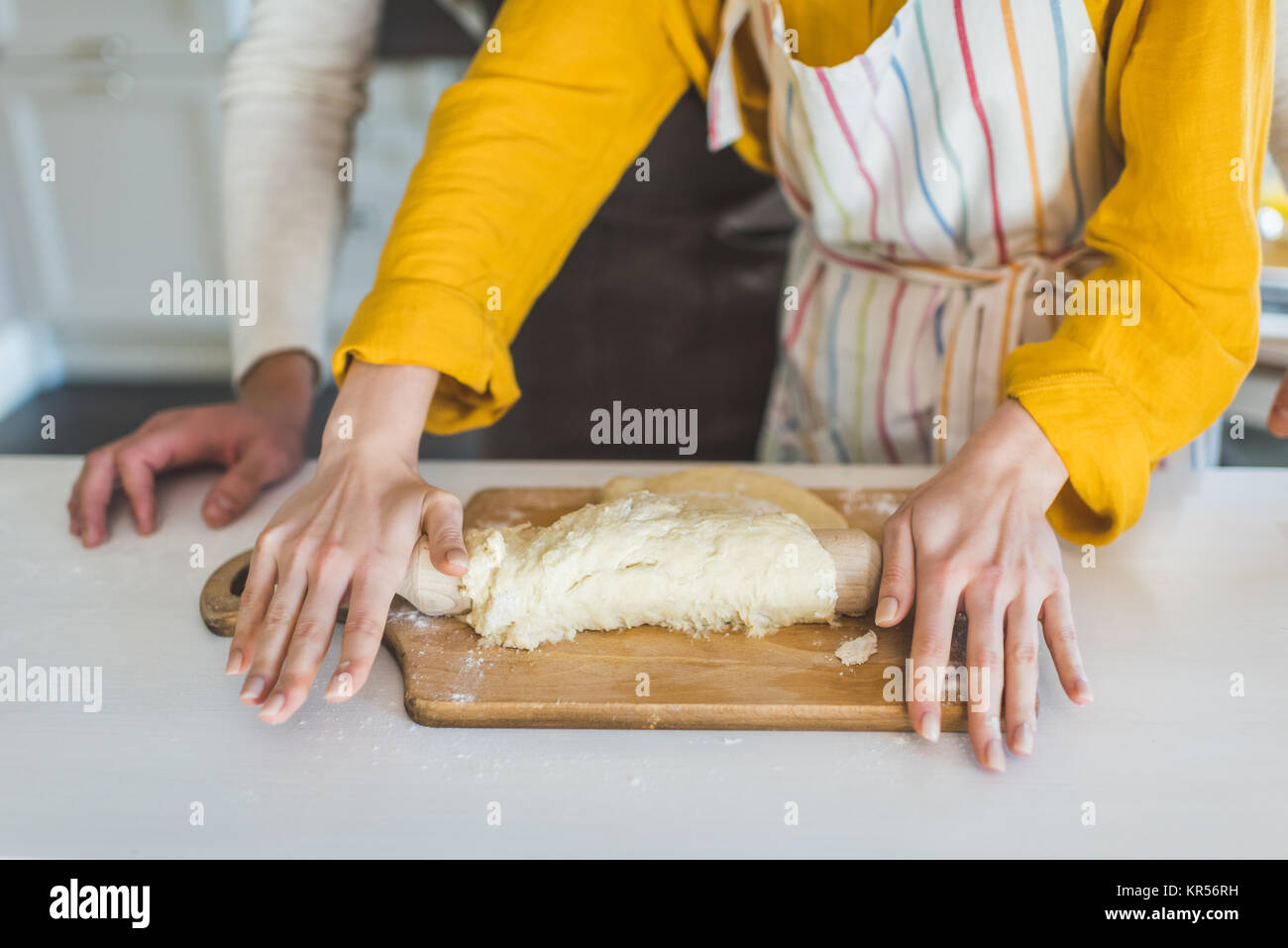 couple making dough Stock Photo - Alamy