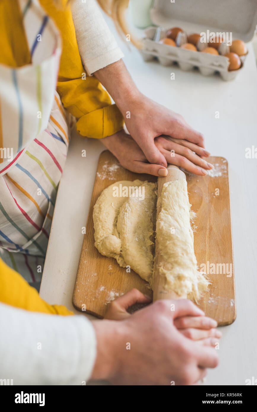 couple making dough Stock Photo - Alamy