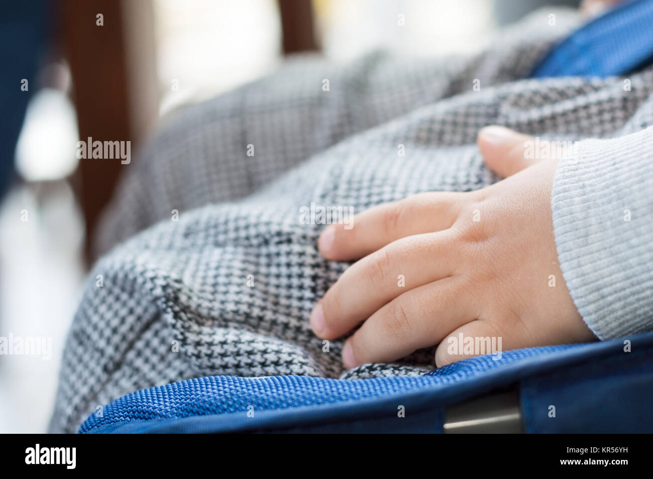 Close up of a baby hand sleeping on the stroller Stock Photo - Alamy