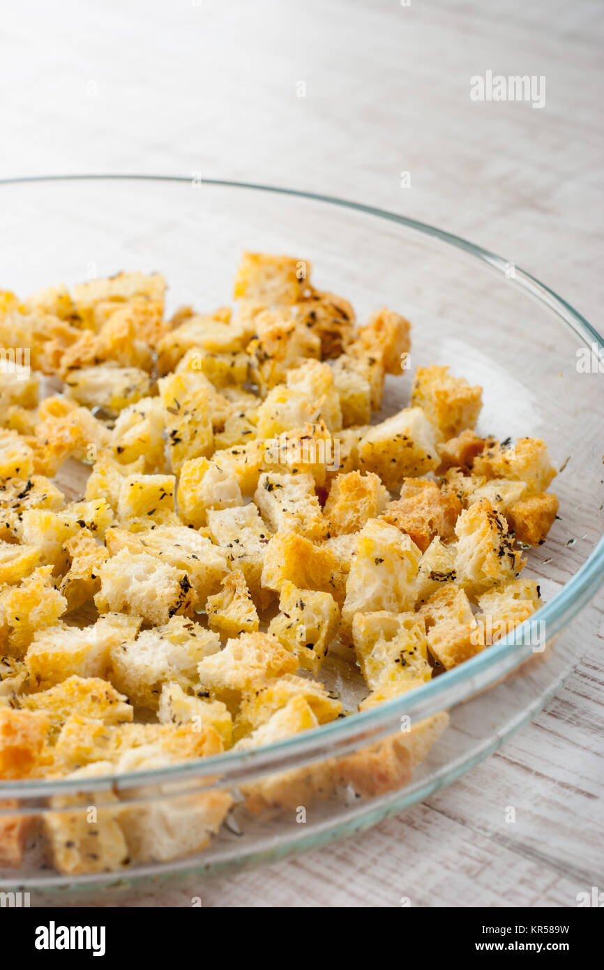 Small croutons with pepper on the glass dish at the left of the table ...