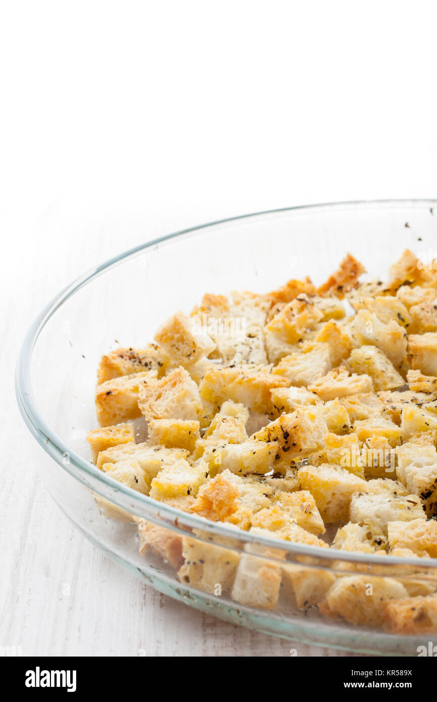 Small croutons with pepper on the glass dish at the right of the table ...