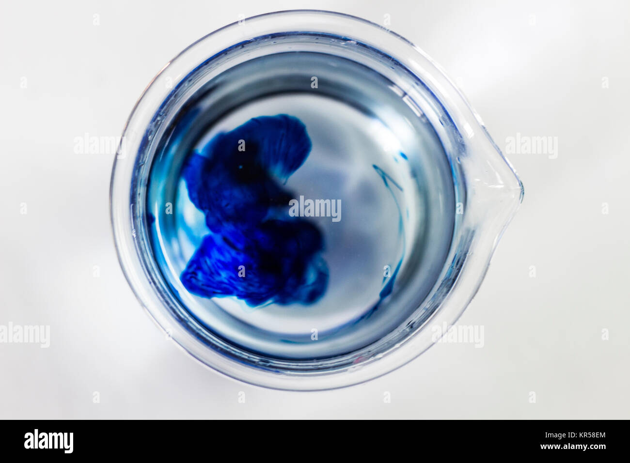 blue in water beaker Stock Photo - Alamy