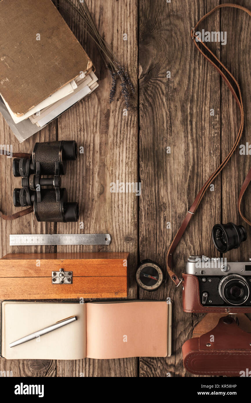 Traveler things on the wooden background top view Stock Photo - Alamy