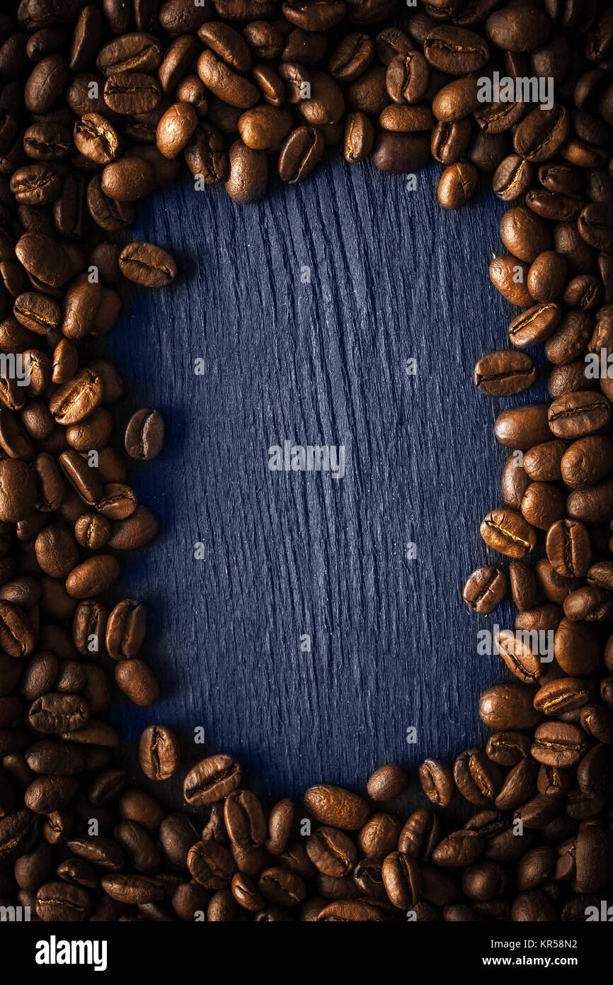 Coffee bean frame on the dark background vertical Stock Photo - Alamy