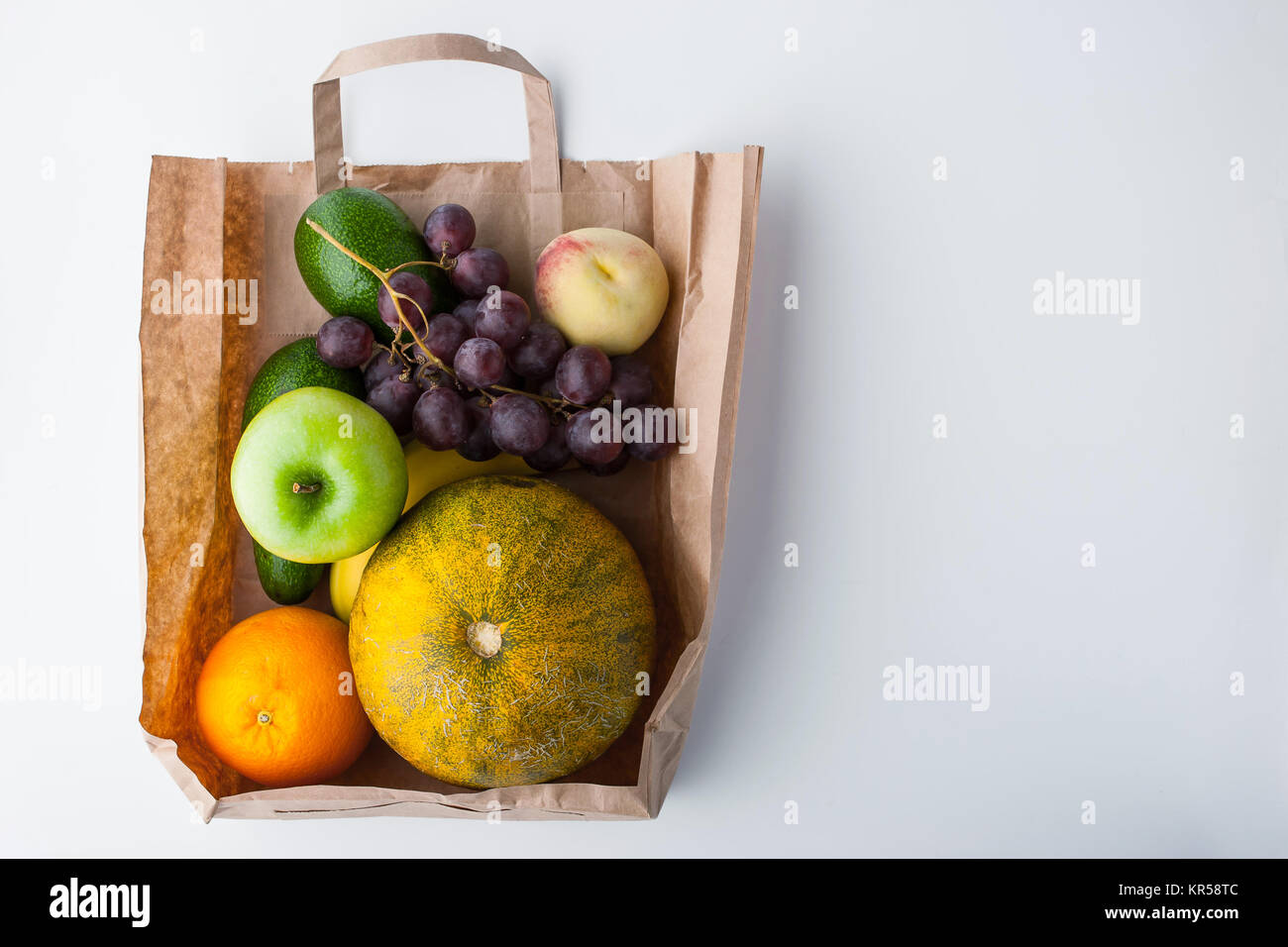Fruit mix inside a paper bag Stock Photo - Alamy