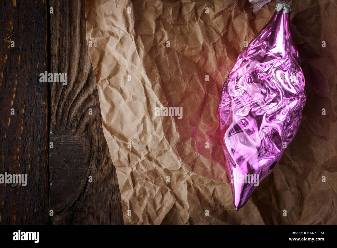 Christmas tree decoration in the crumpled paper top view Stock Photo ...