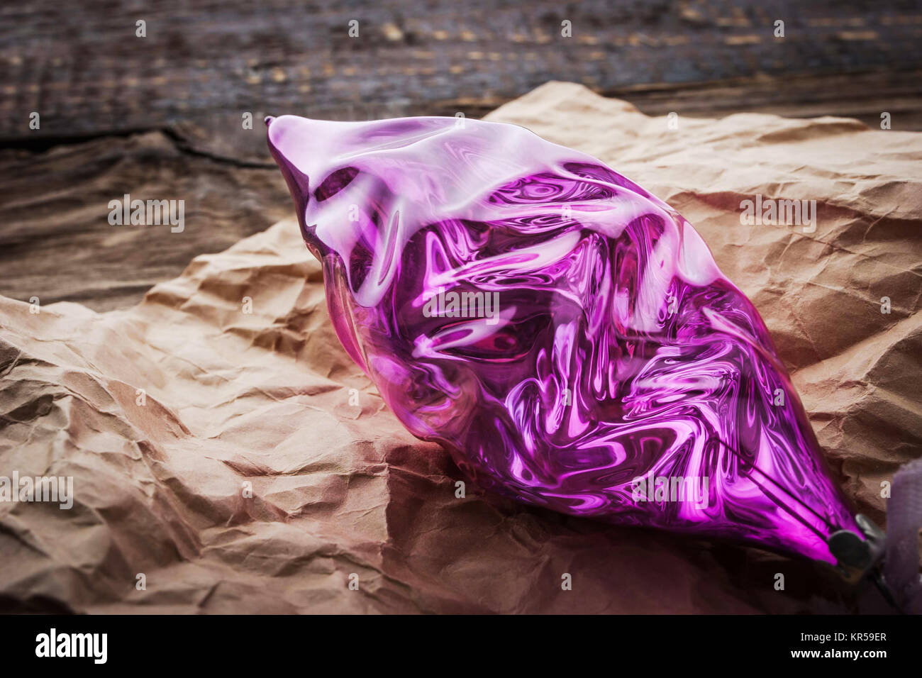 Christmas tree decoration in the crumpled paper close-up Stock Photo ...