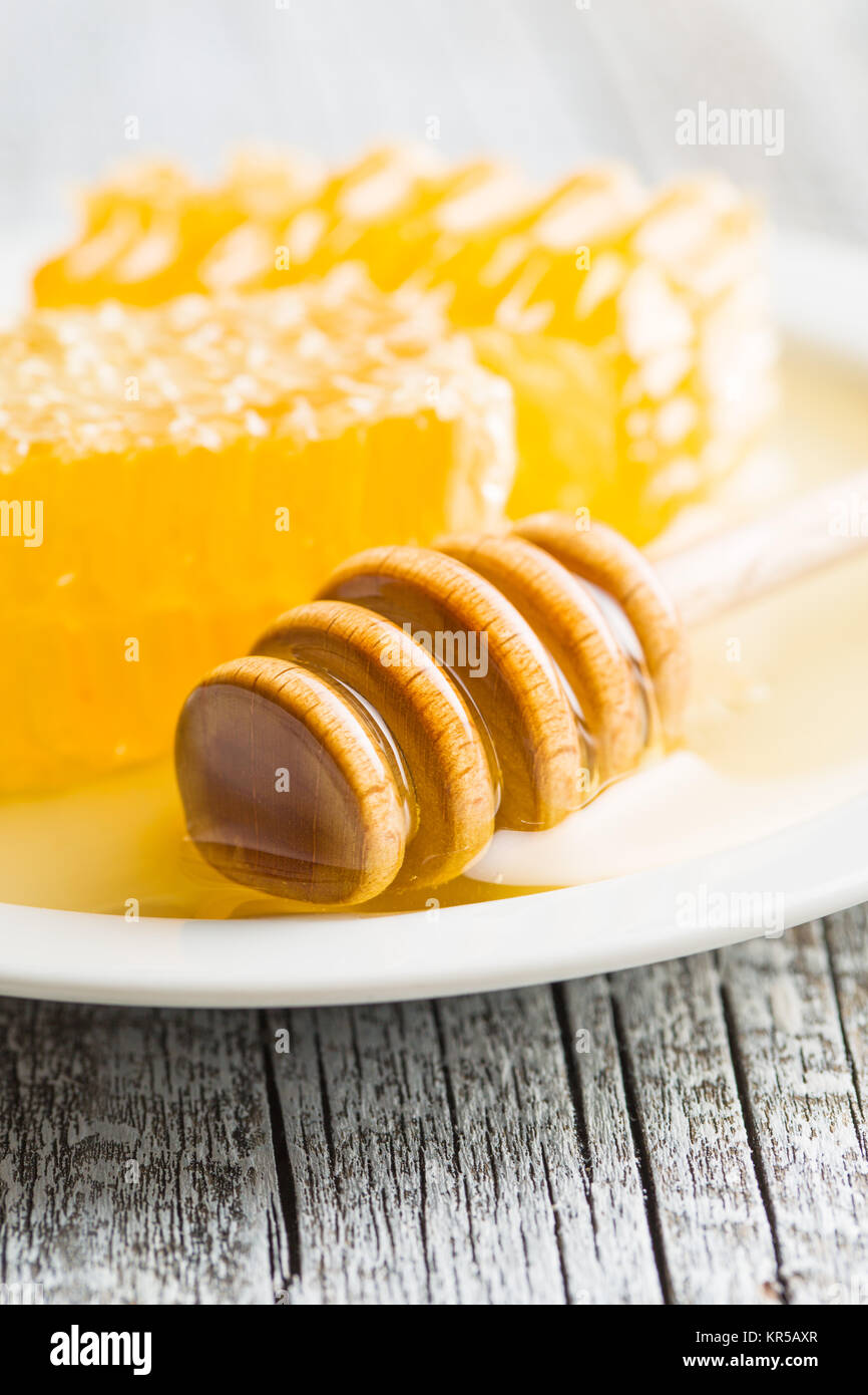 wooden honey stick Stock Photo - Alamy
