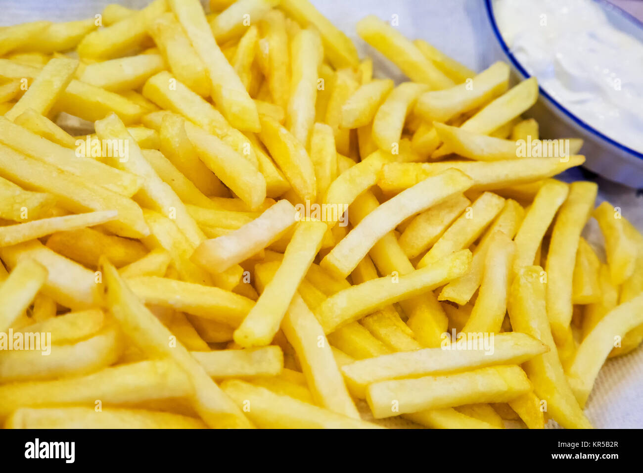 Chips over plate Stock Photo - Alamy
