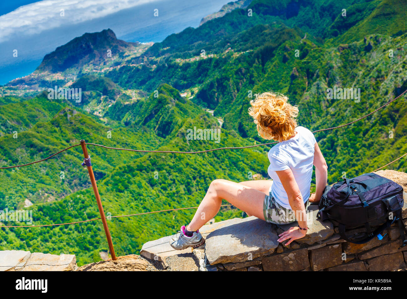 Woman in a mountain viewpoint. Faial area view from Pico do Arieiro ...