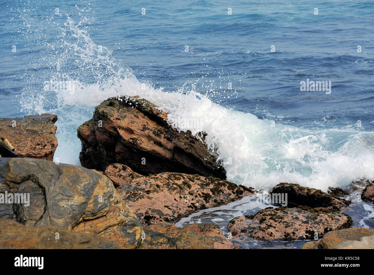 Wave of the ocean on the sand beach Stock Photo - Alamy