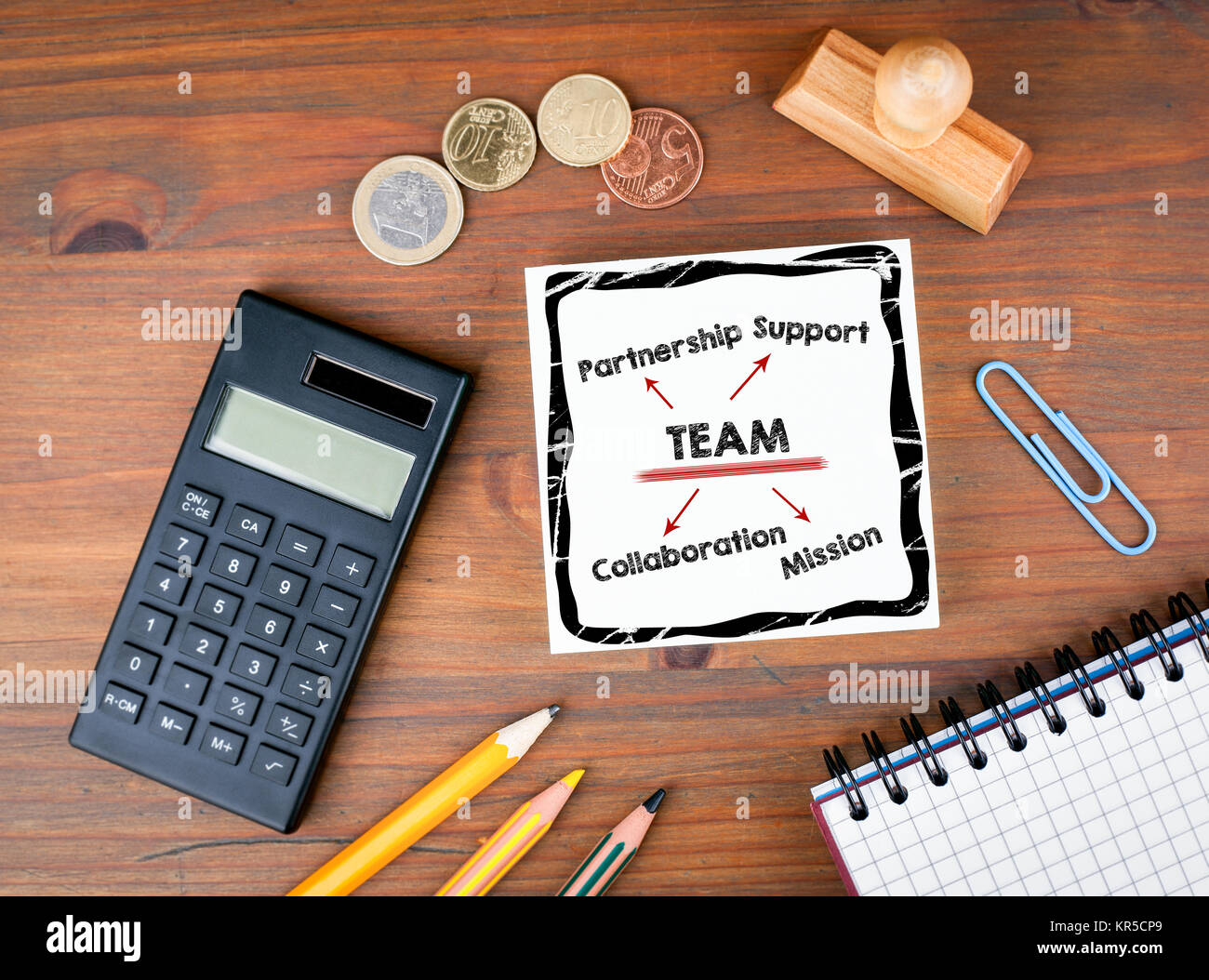 team concept. Office desk with stationery, chart and communication ...