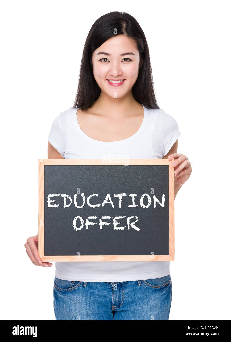 Student with chalkboard showing education offer Stock Photo - Alamy