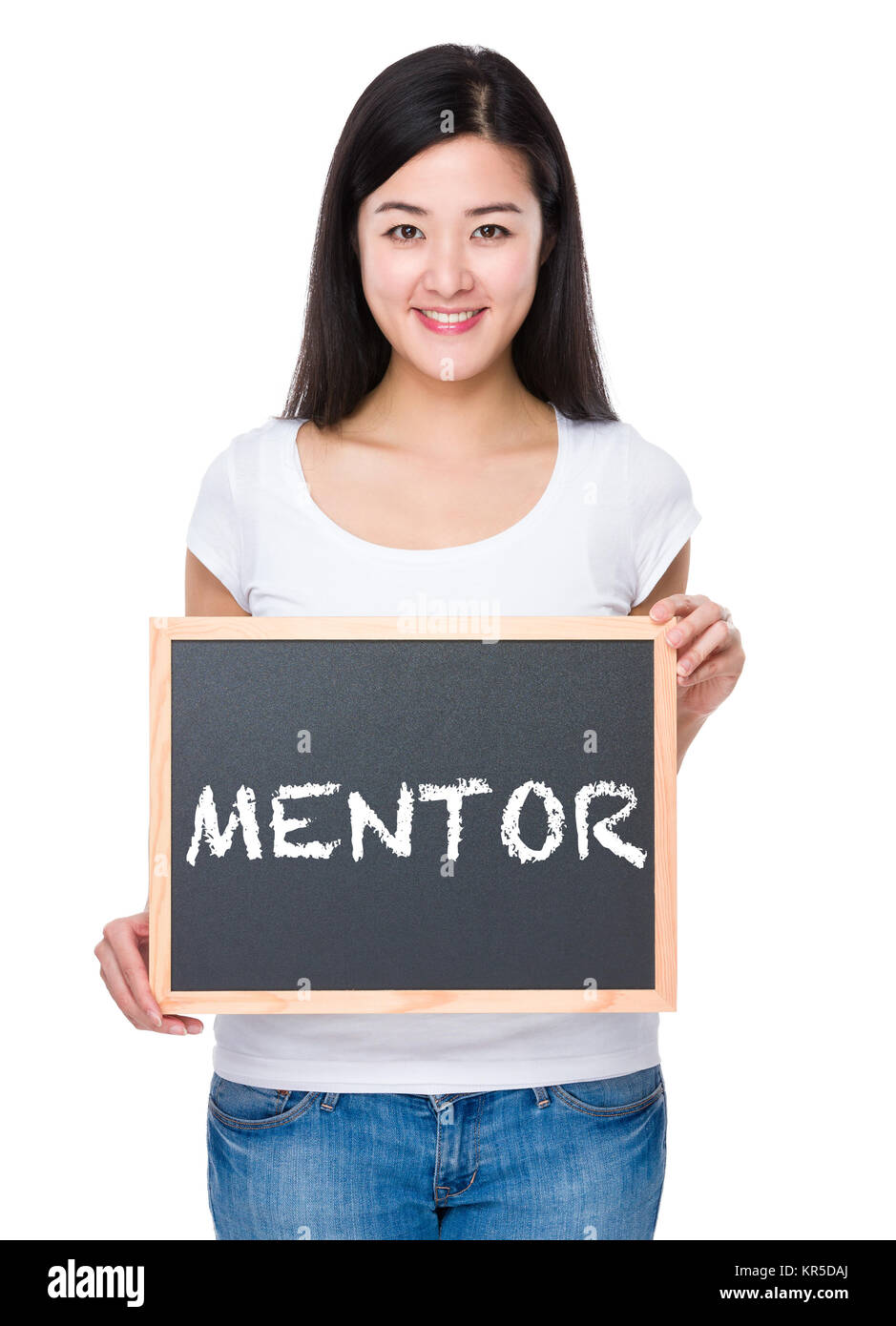 Student with chalkboard showing a word mentor Stock Photo - Alamy