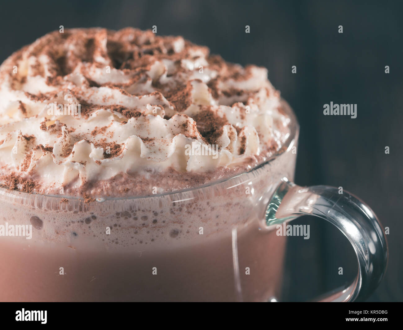 Glass cup with hot chocolate and whipped cream Stock Photo - Alamy